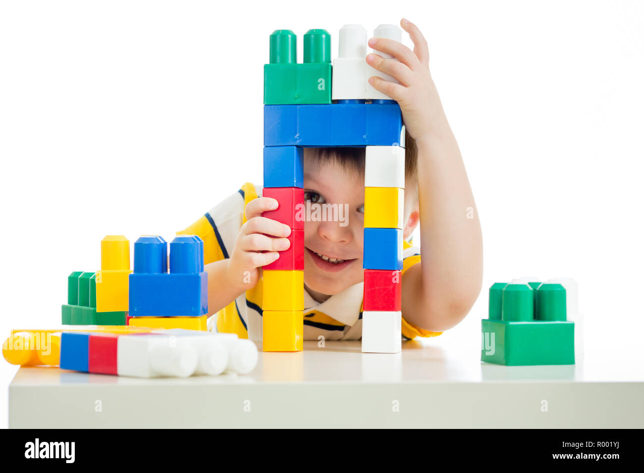 funny child boy playing with toys, isolated on white background Stock ...