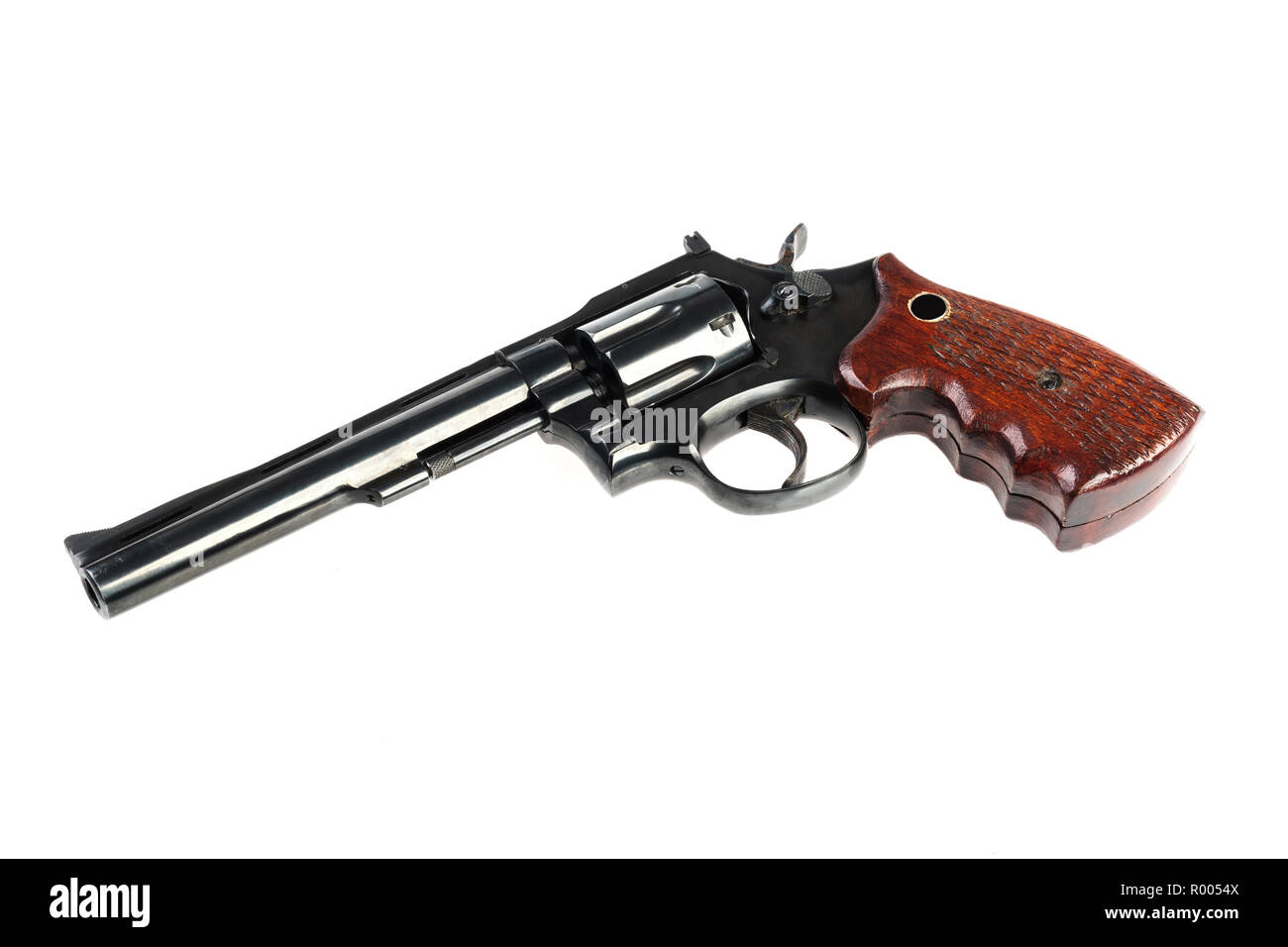 isolated used old black revolver on a white background Stock Photo - Alamy