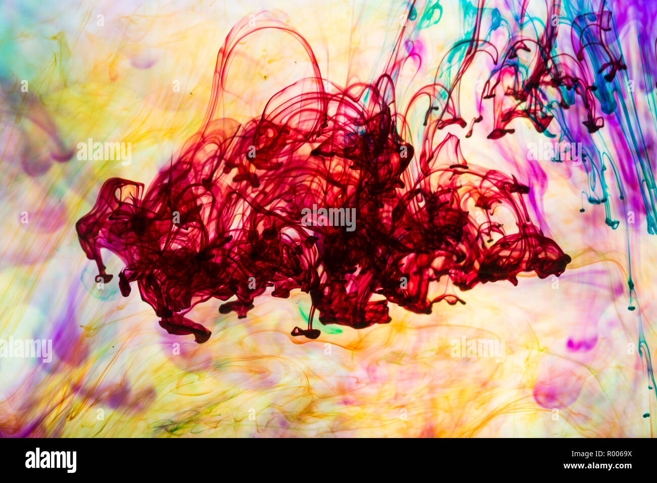 Acrylic colors and ink in water. Abstract background Stock Photo - Alamy