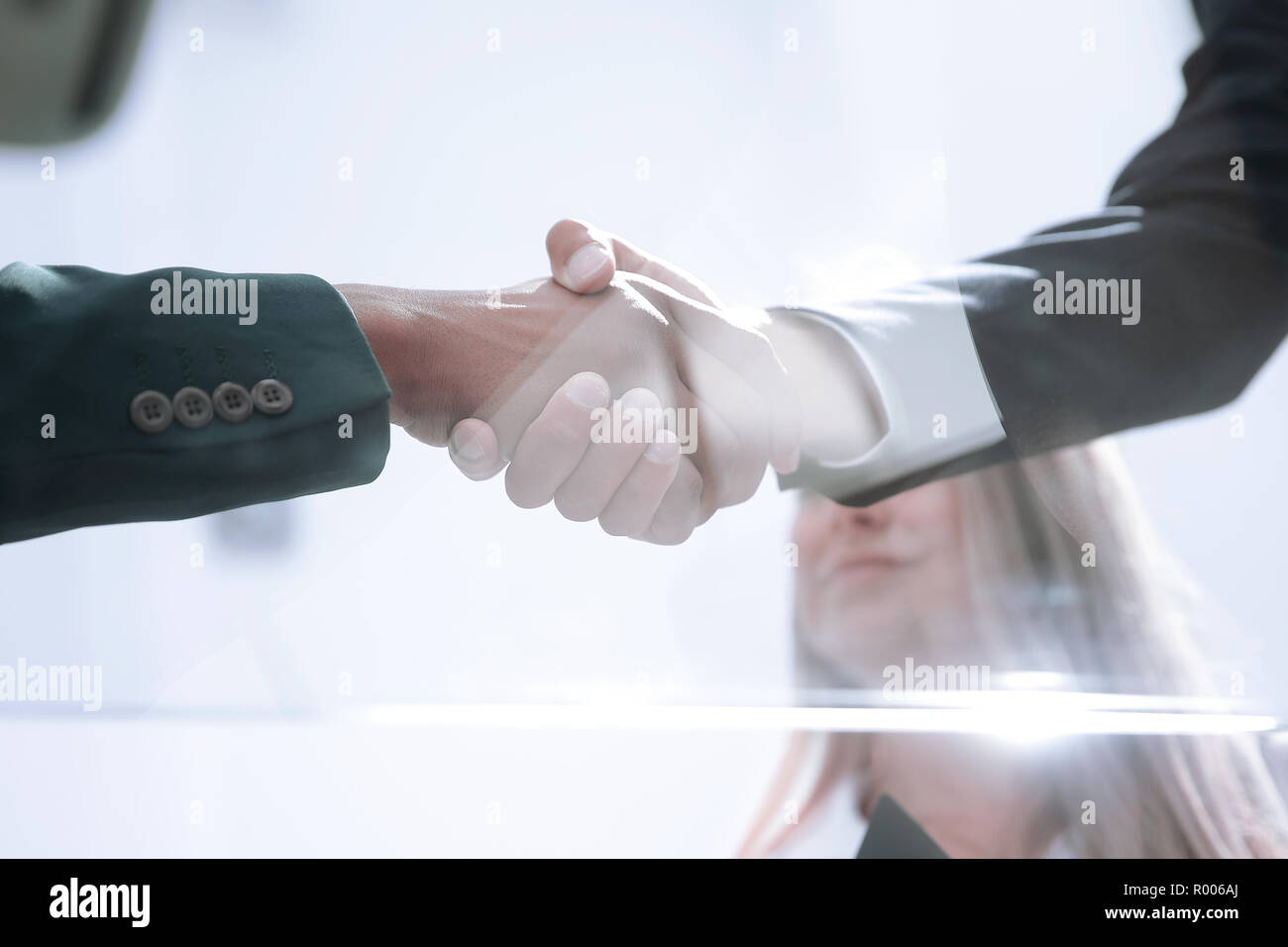 bottom view.closeup of a business handshake partners Stock Photo - Alamy