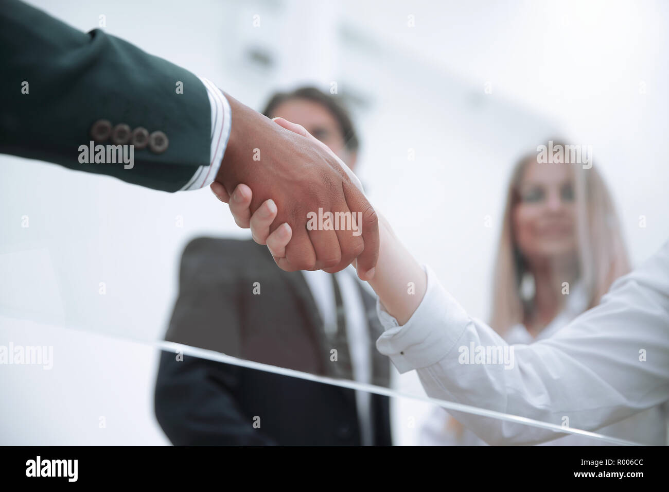 bottom view .handshake business women with a business partner Stock ...