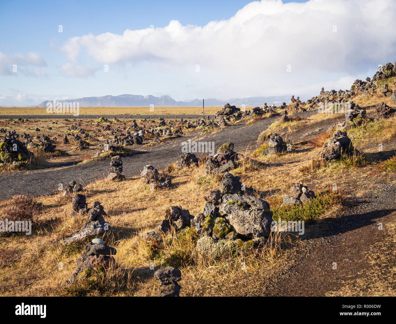 Laufskalavarda -- a lava ridge, surrounded by stone cairns in South ...