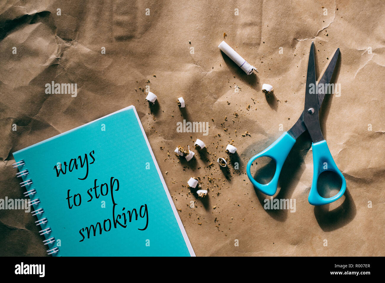 scissors, notepad, cutted cigaretteworld no tobacco day Stock Photo - Alamy