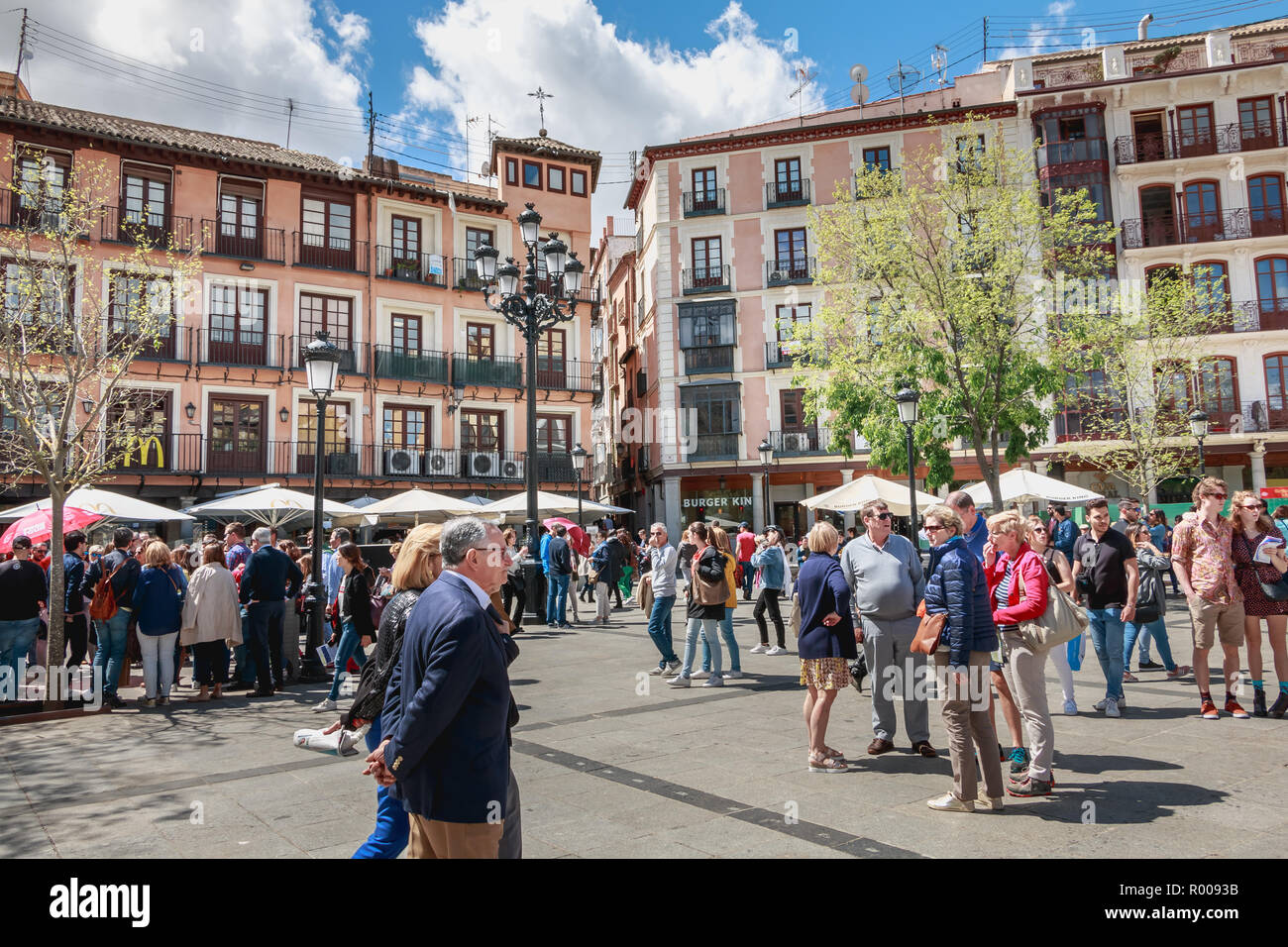 Toledo, Spain - April 27, 2018 - tourists strolling quietly on the main ...