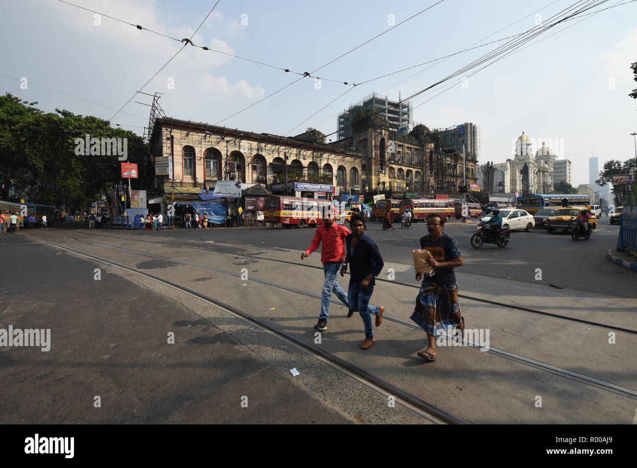 People are running at the Chowringhee road, Esplanade, Kolkata, India ...