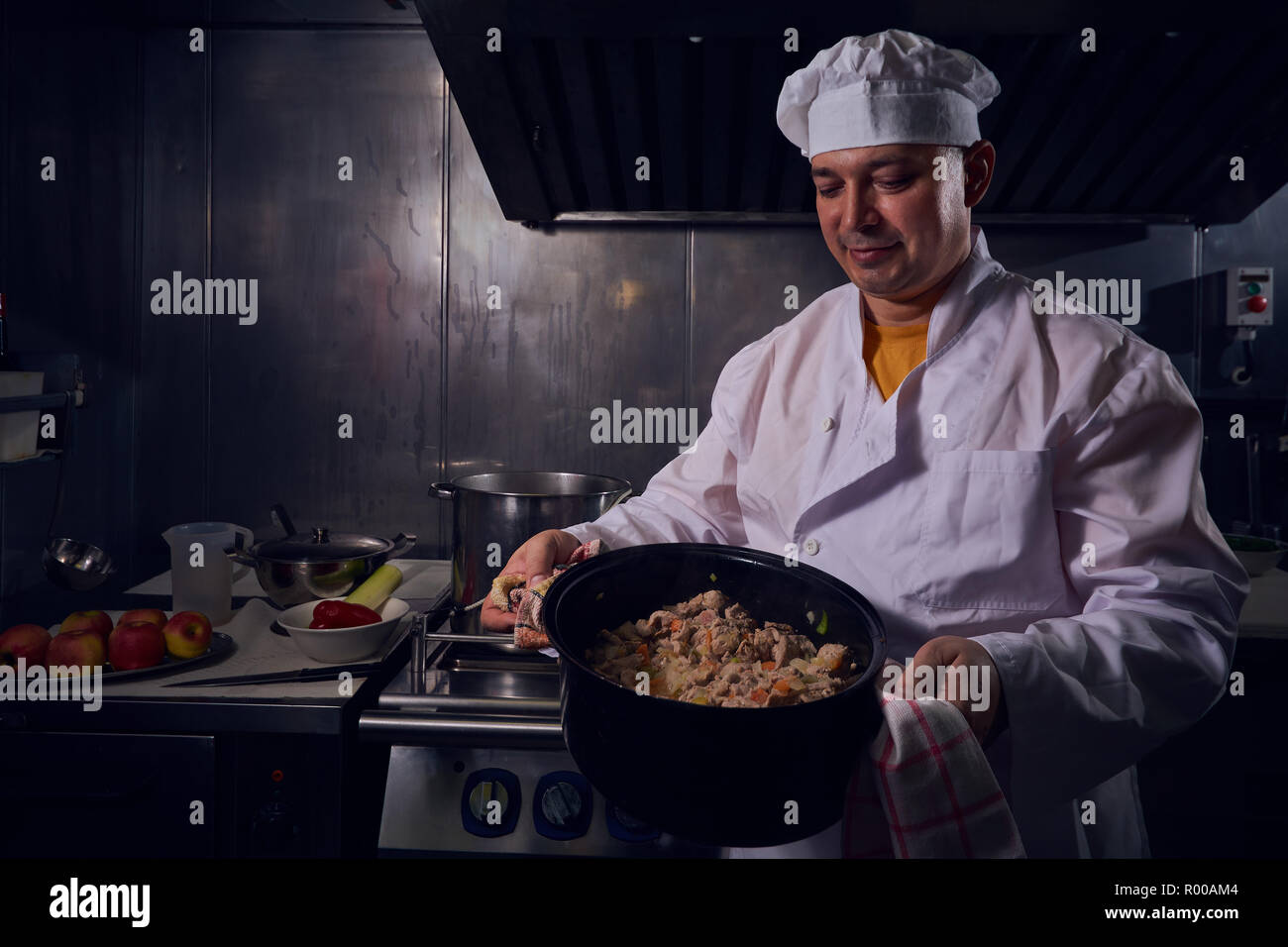 Chef in full uniform hi-res stock photography and images - Alamy