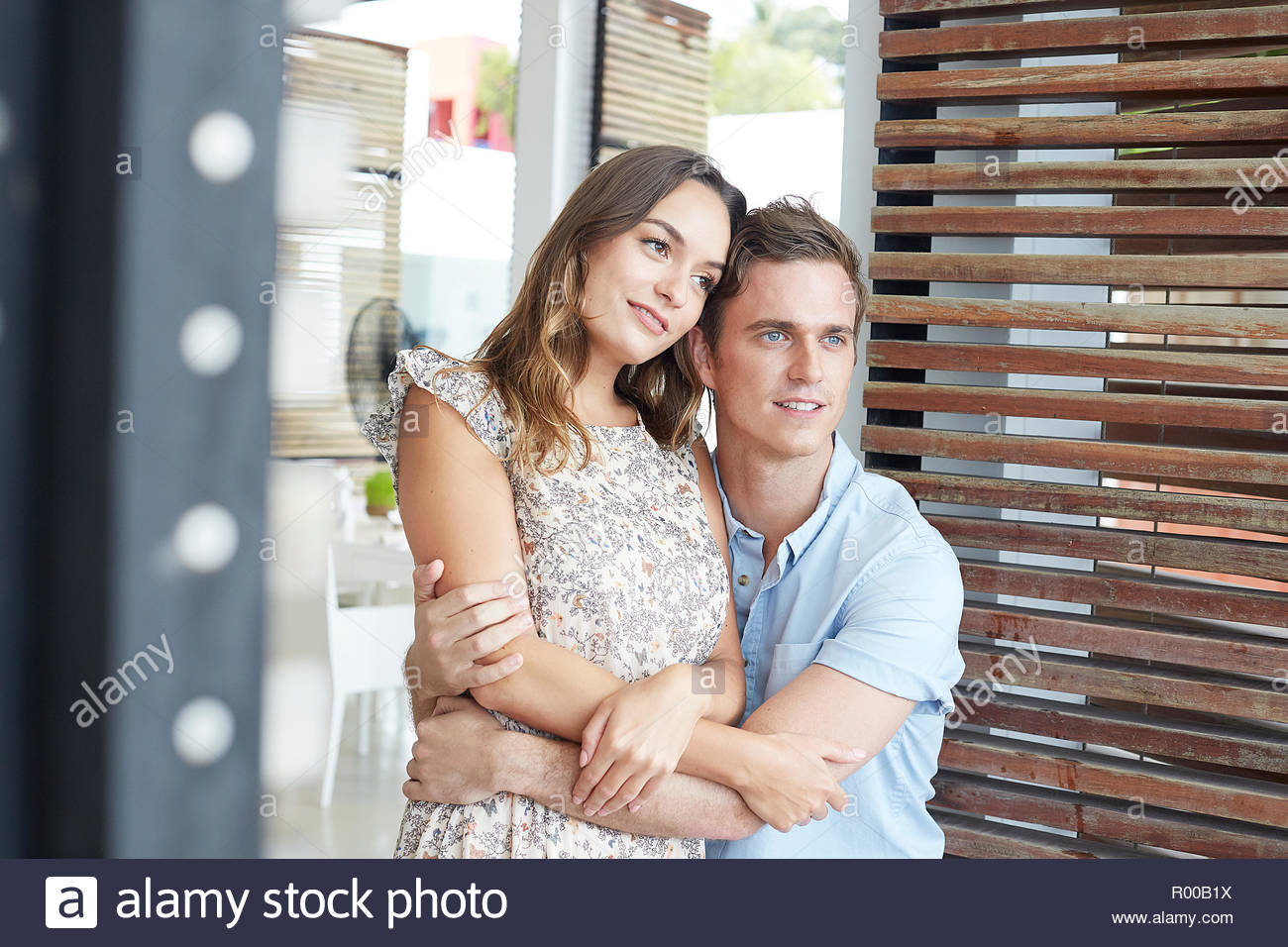 Romantic Couple Sitting On Chair Stock Photos & Romantic Couple Sitting ...