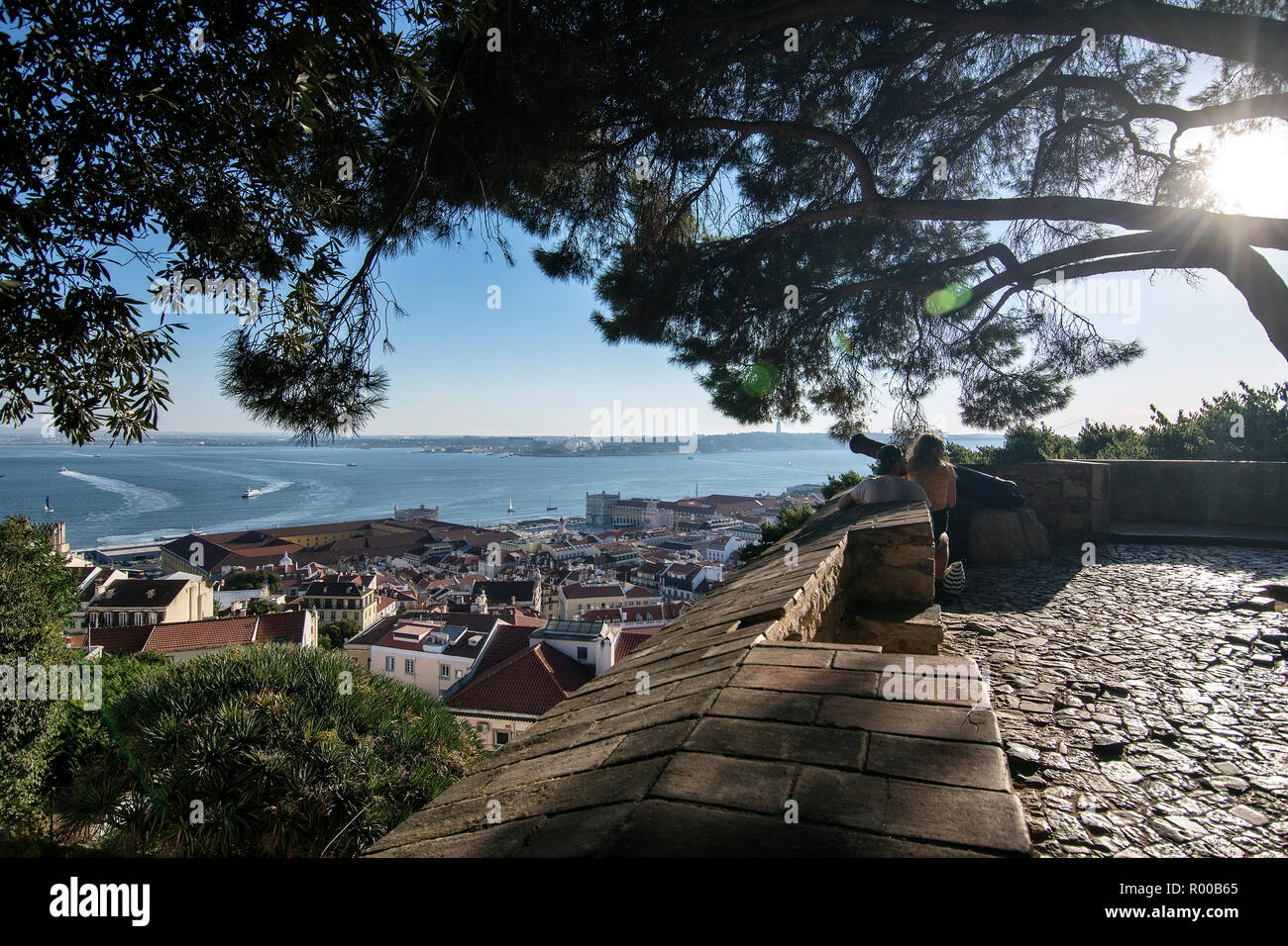 Tourists at the Miradouro do Castelo de Sao Jorge view point in the ...
