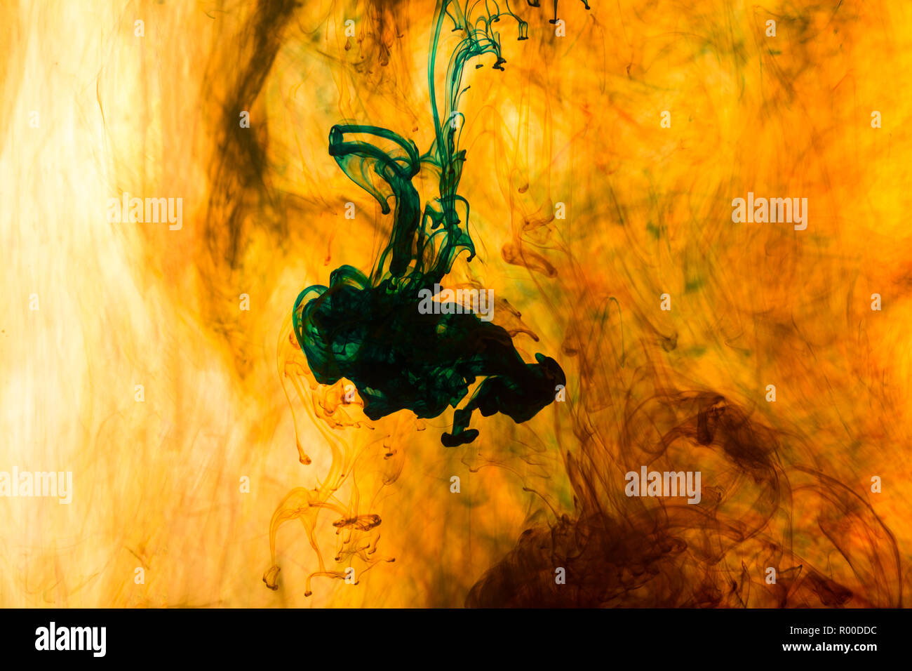 Acrylic colors and ink in water. Abstract background Stock Photo - Alamy
