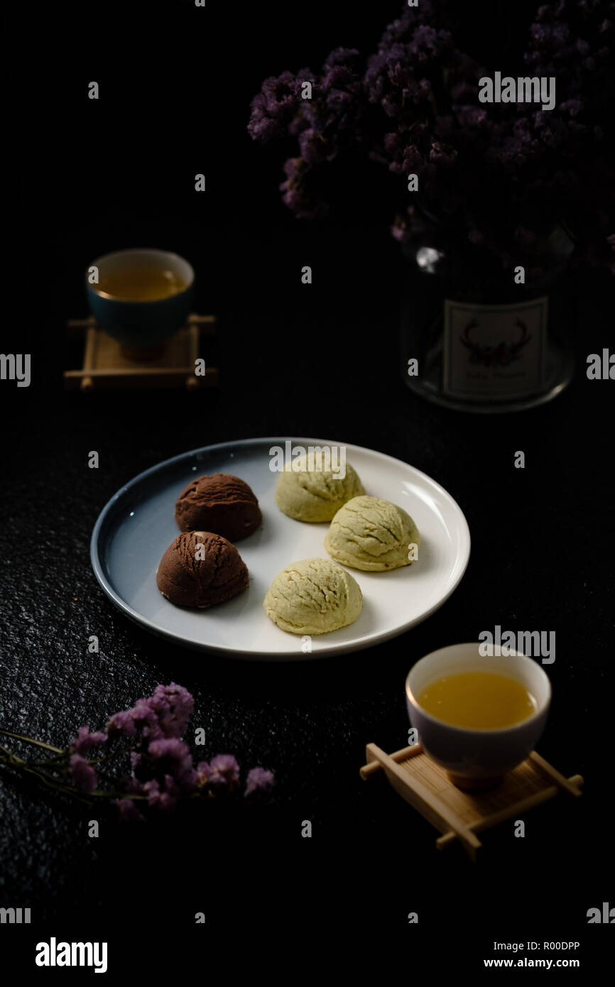 Homemade ice-cream Gelato Cookie serve with white plate, dark style ...