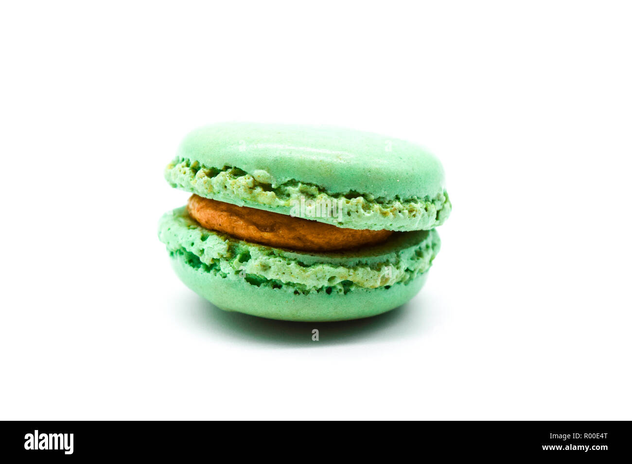 green macaron isolated on white background, one macaron Stock Photo - Alamy
