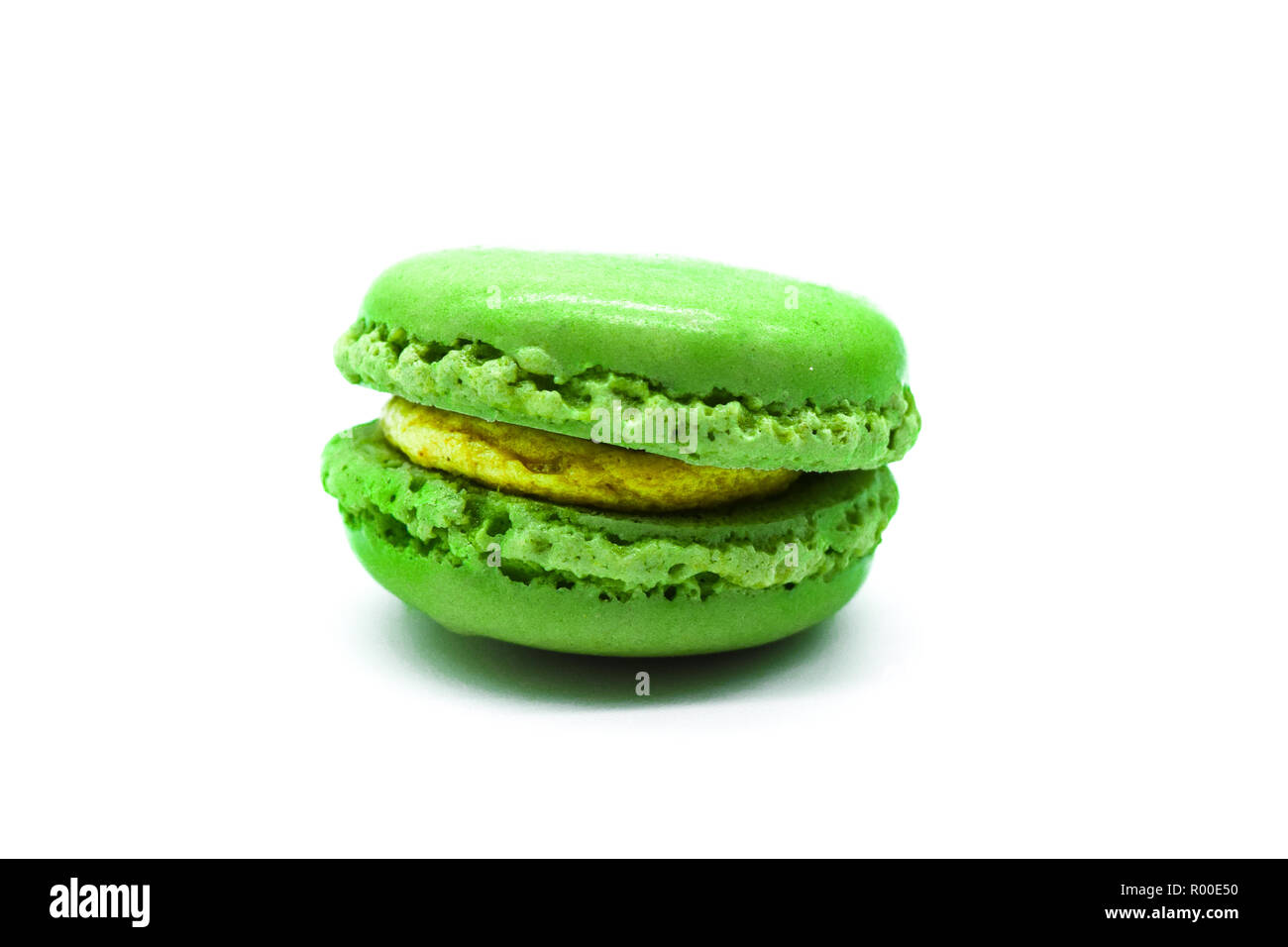 green macaron isolated on white background, one macaron Stock Photo - Alamy