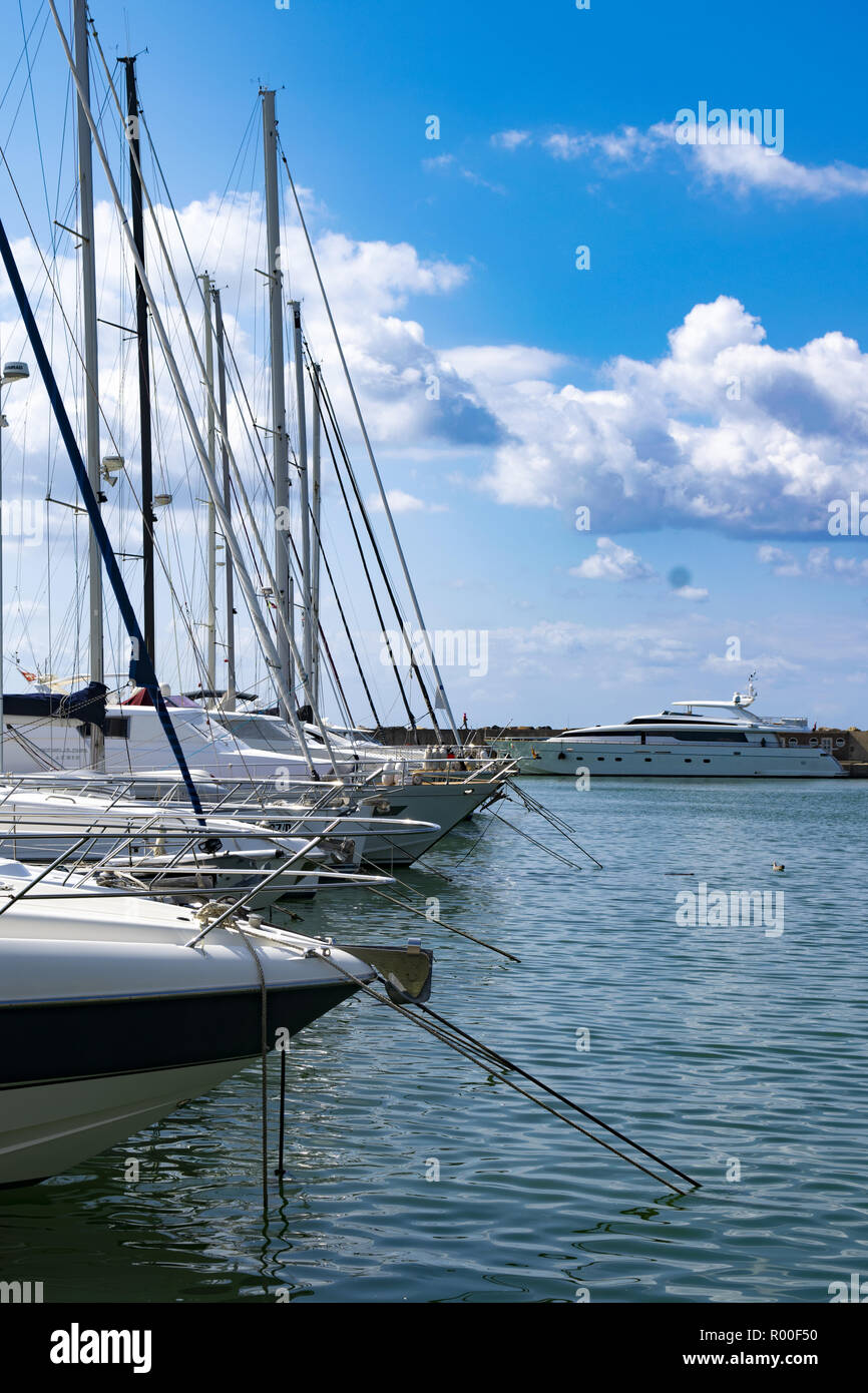 view of the port of Rome with anchored boats Stock Photo - Alamy