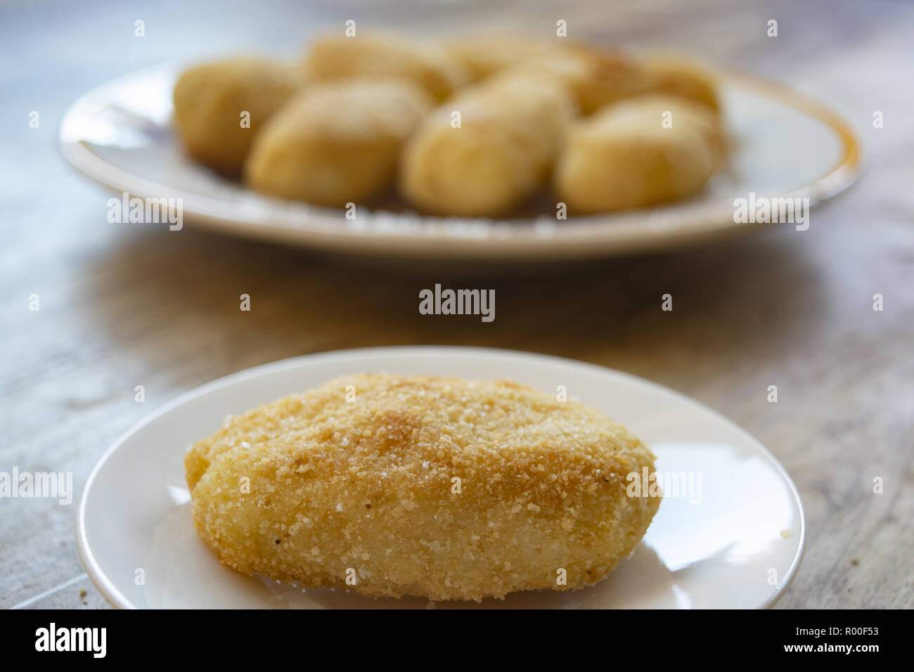 fried potato rissole on a white dish Stock Photo - Alamy