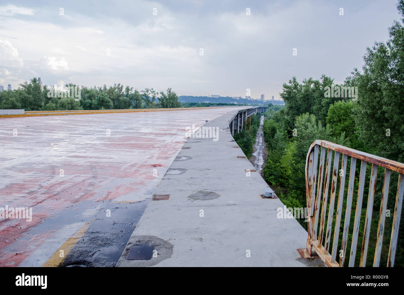 old, abandoned road with sidewalk goes to the horizon Stock Photo - Alamy