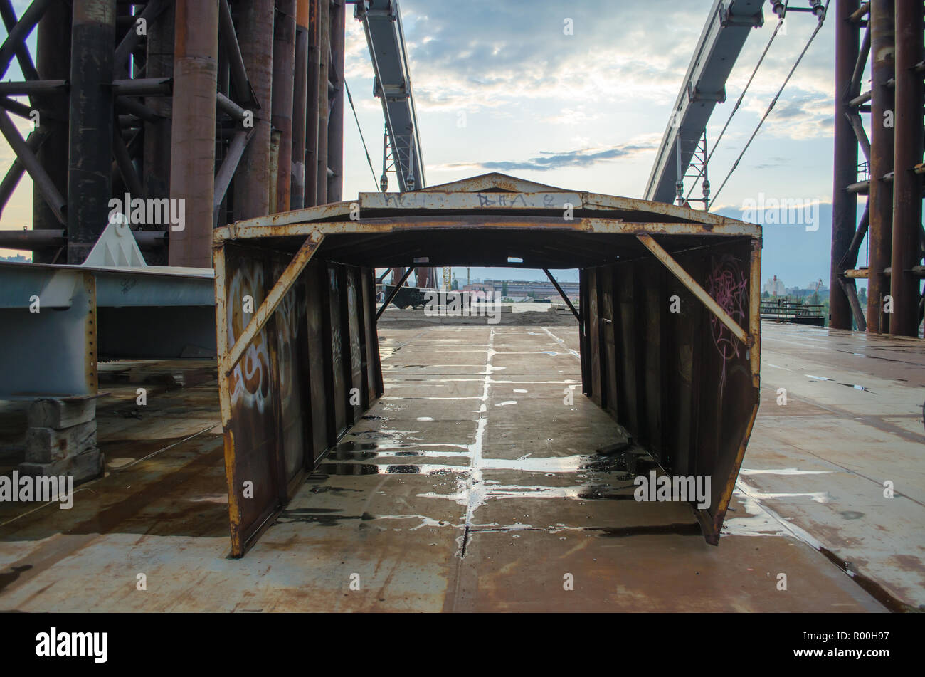 Unfinished bridge. Abandoned industrial metal ruins Stock Photo - Alamy