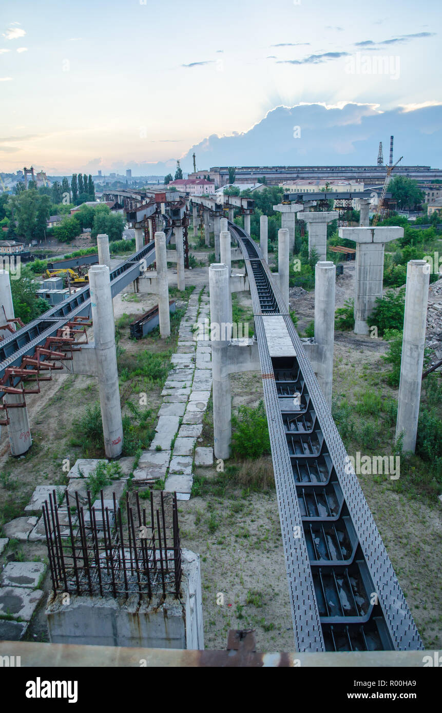 Unfinished bridge. Abandoned industrial metal ruins Stock Photo - Alamy