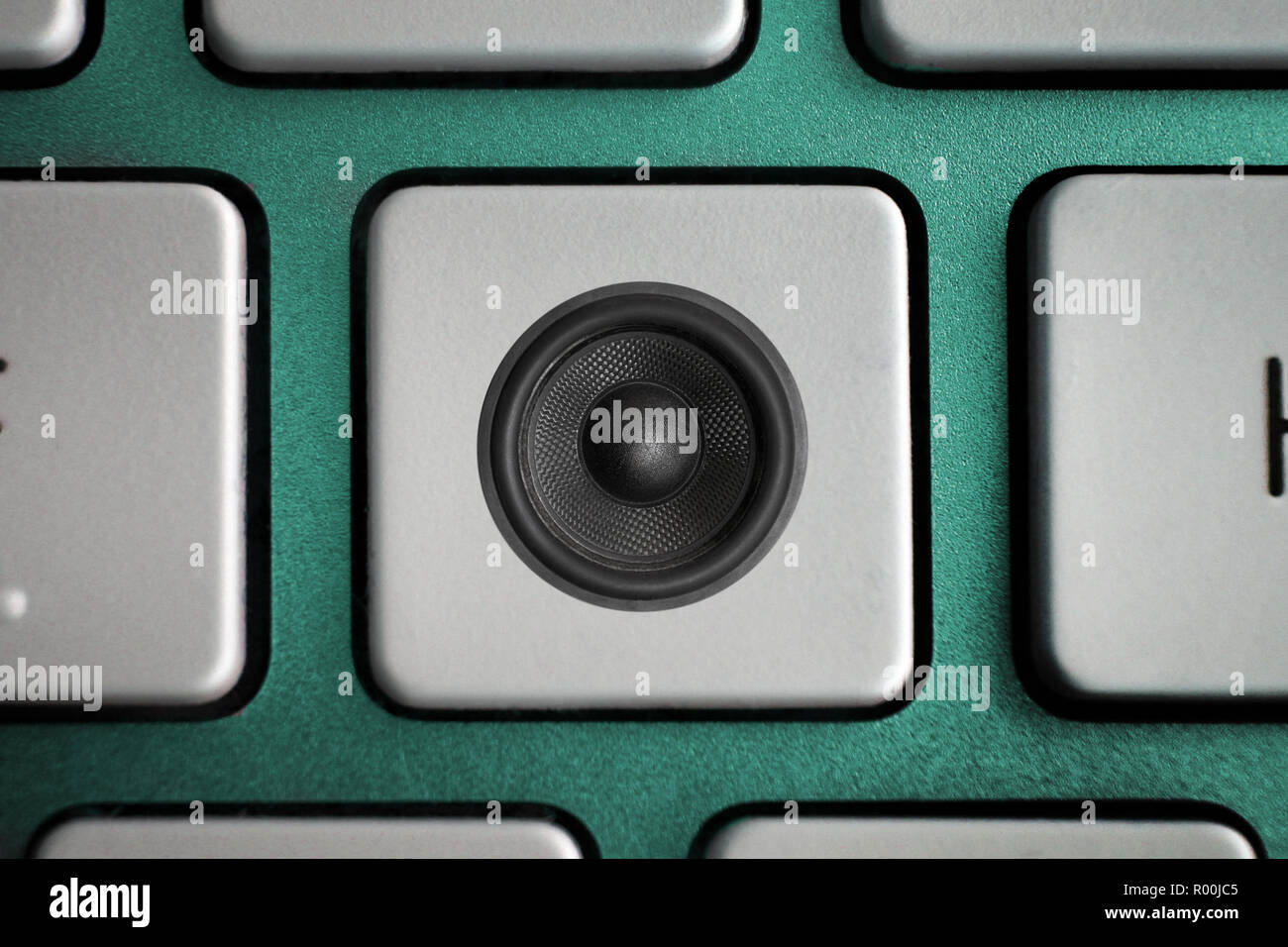 Key on keyboard with music audio speaker woofer icon Stock Photo - Alamy