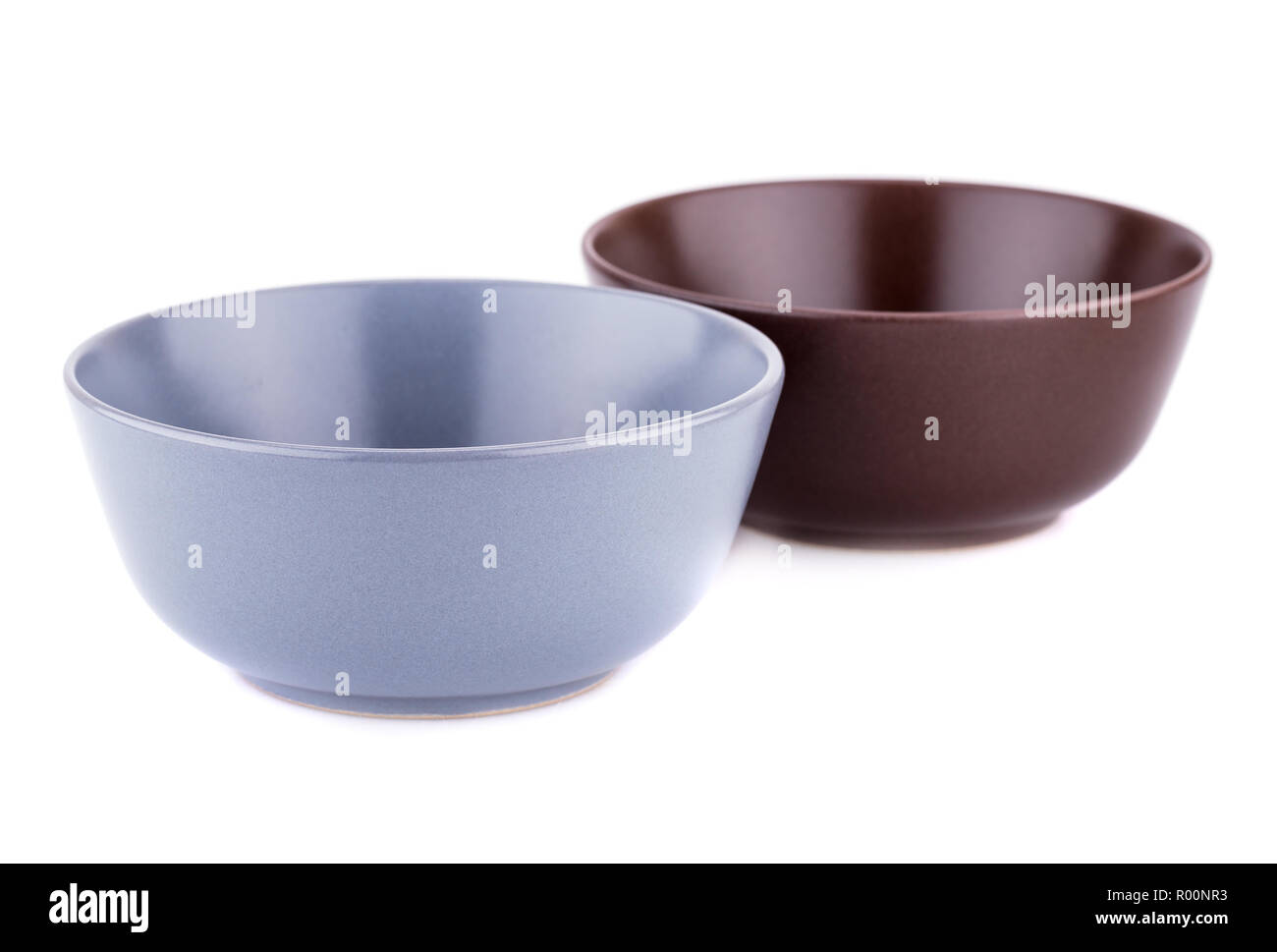 Two empty bowls isolated on white background Stock Photo - Alamy