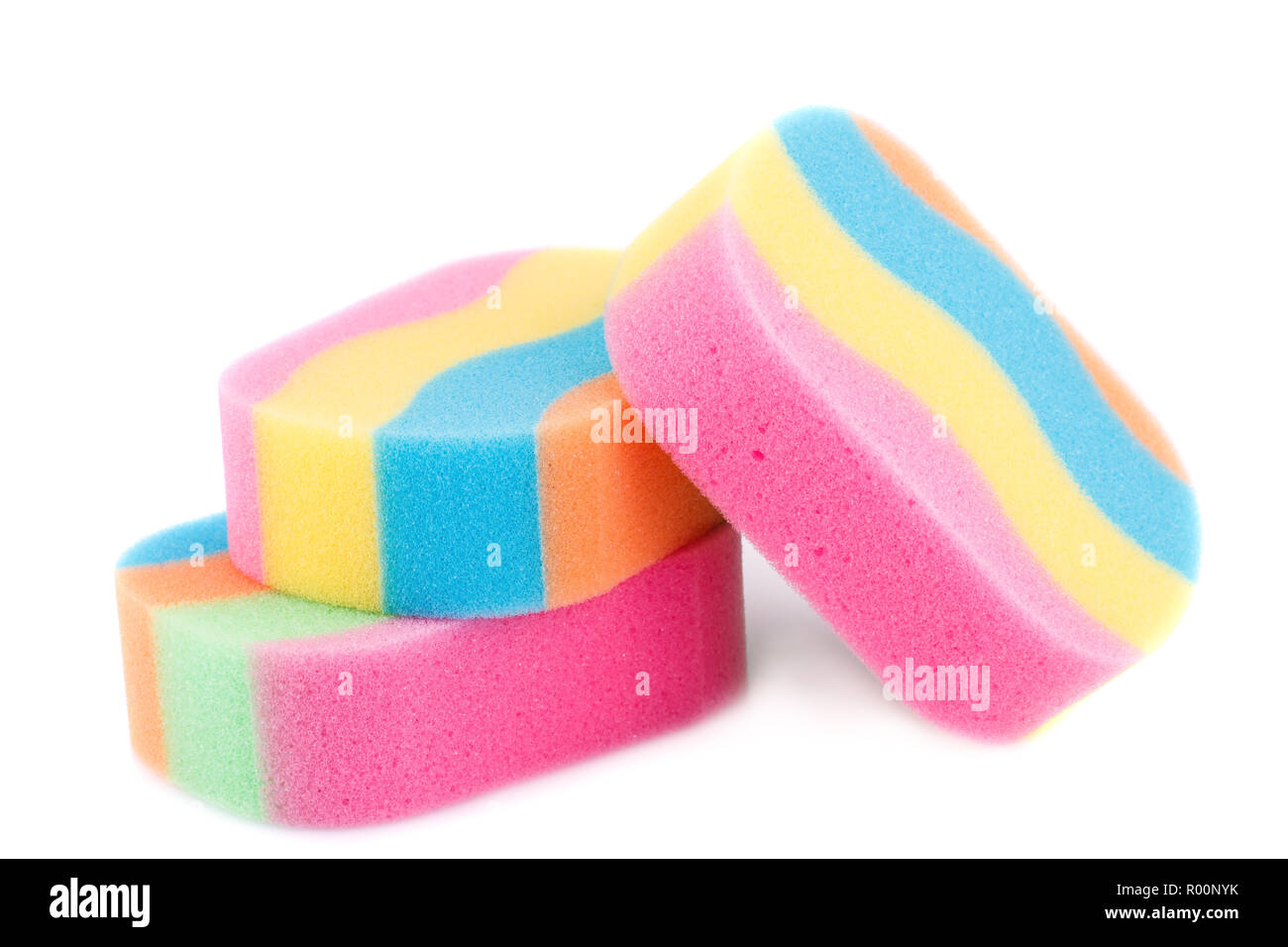 Colorful sponges isolated on white background Stock Photo - Alamy