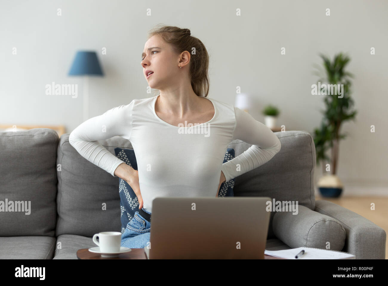 Backache hi-res stock photography and images - Alamy