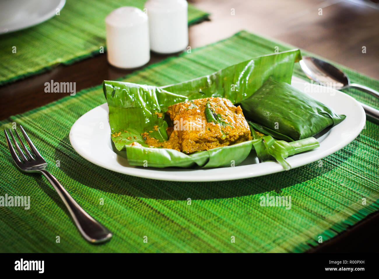 Bengali dish Macher Paturi Stock Photo - Alamy