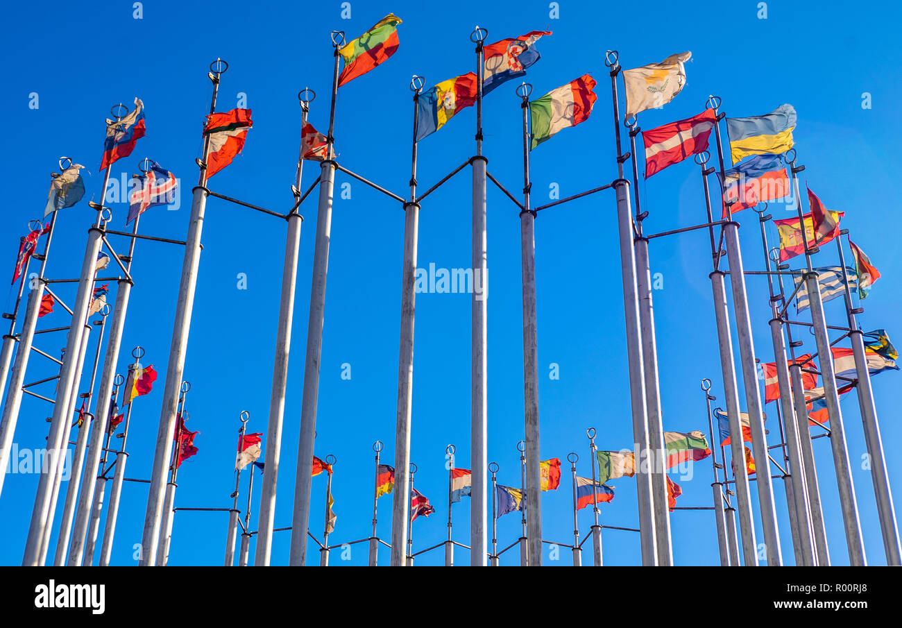 Flags of European countries on flagpoles against the blue sky Stock ...