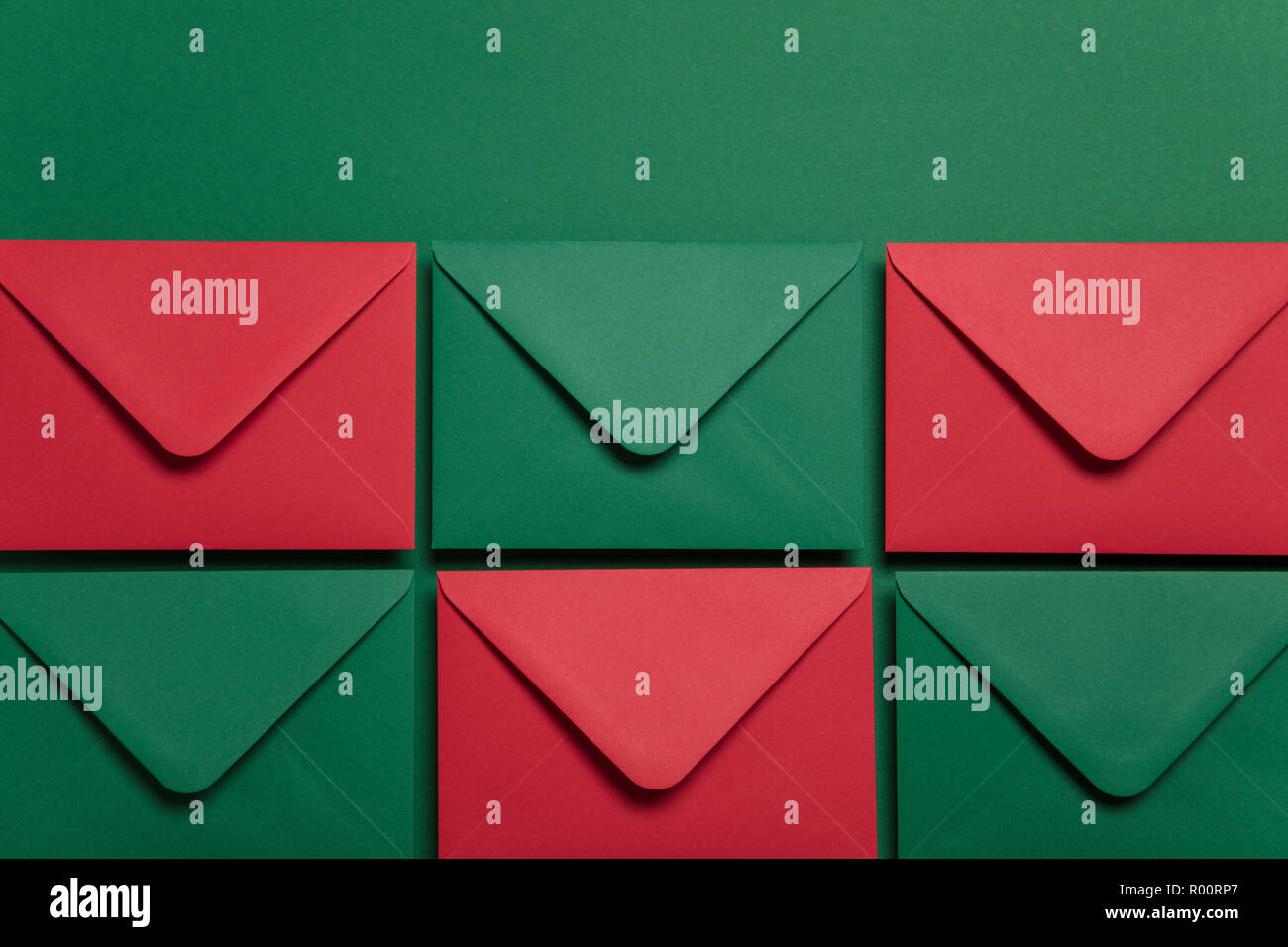 Red and green paper envelopes. Christmas card template mock up Stock ...