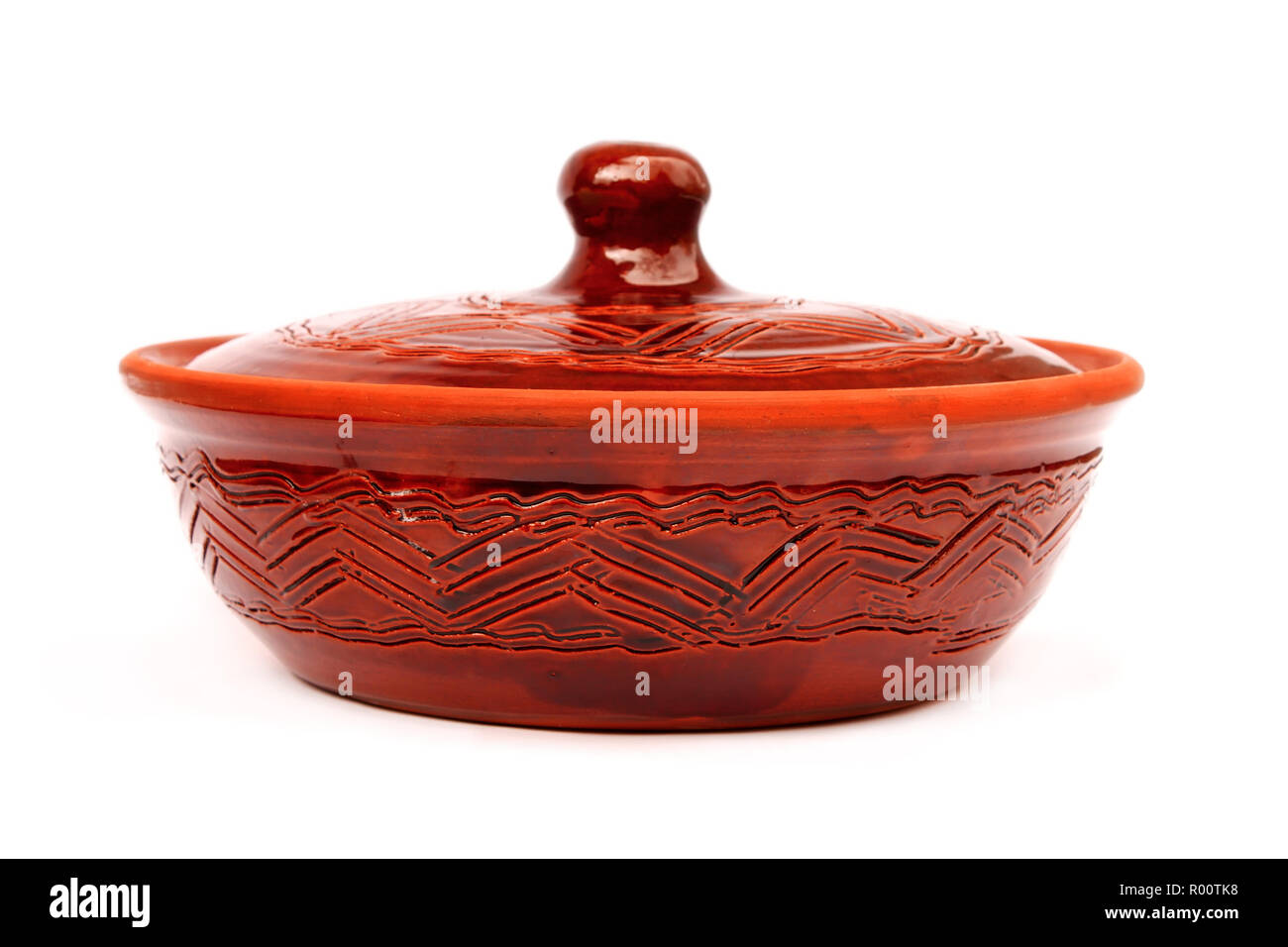 Annealed clay pot with a cover for cooking and prolonged storage of hot ...
