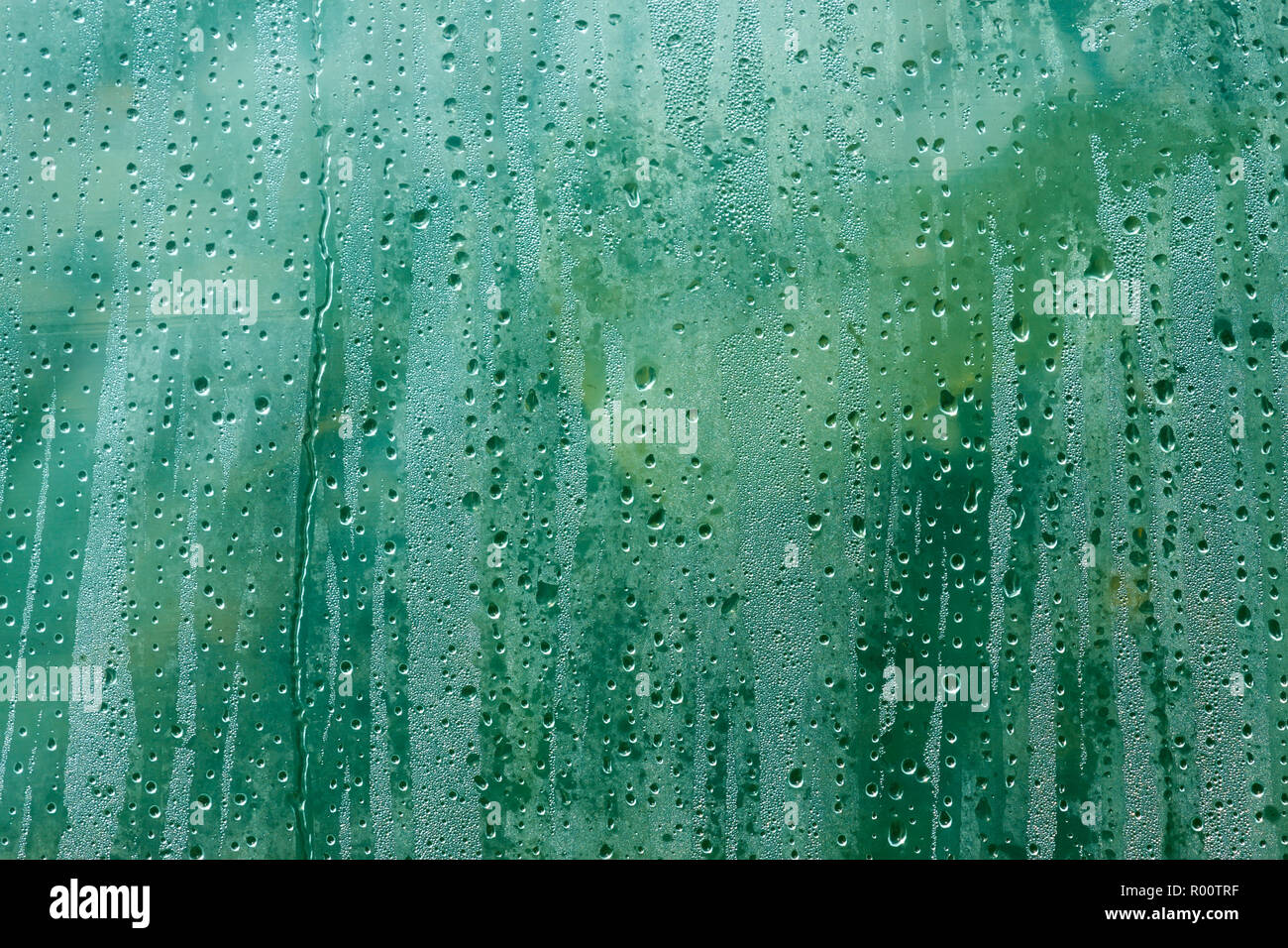 The surface of polyethylene film with a condensed drops of dew on the ...