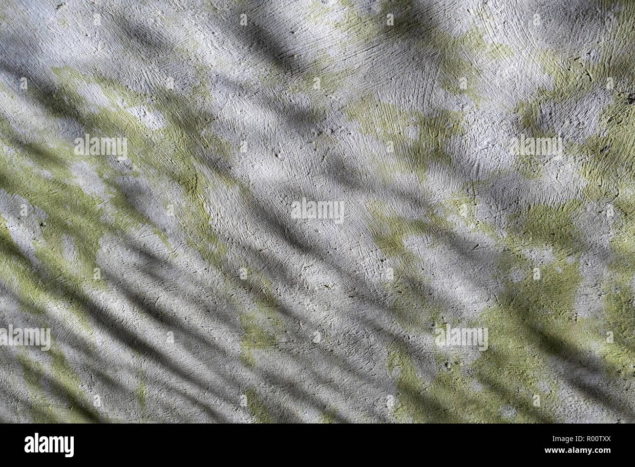 Rather abstract image of water ripples reflected on curved skimmed ...