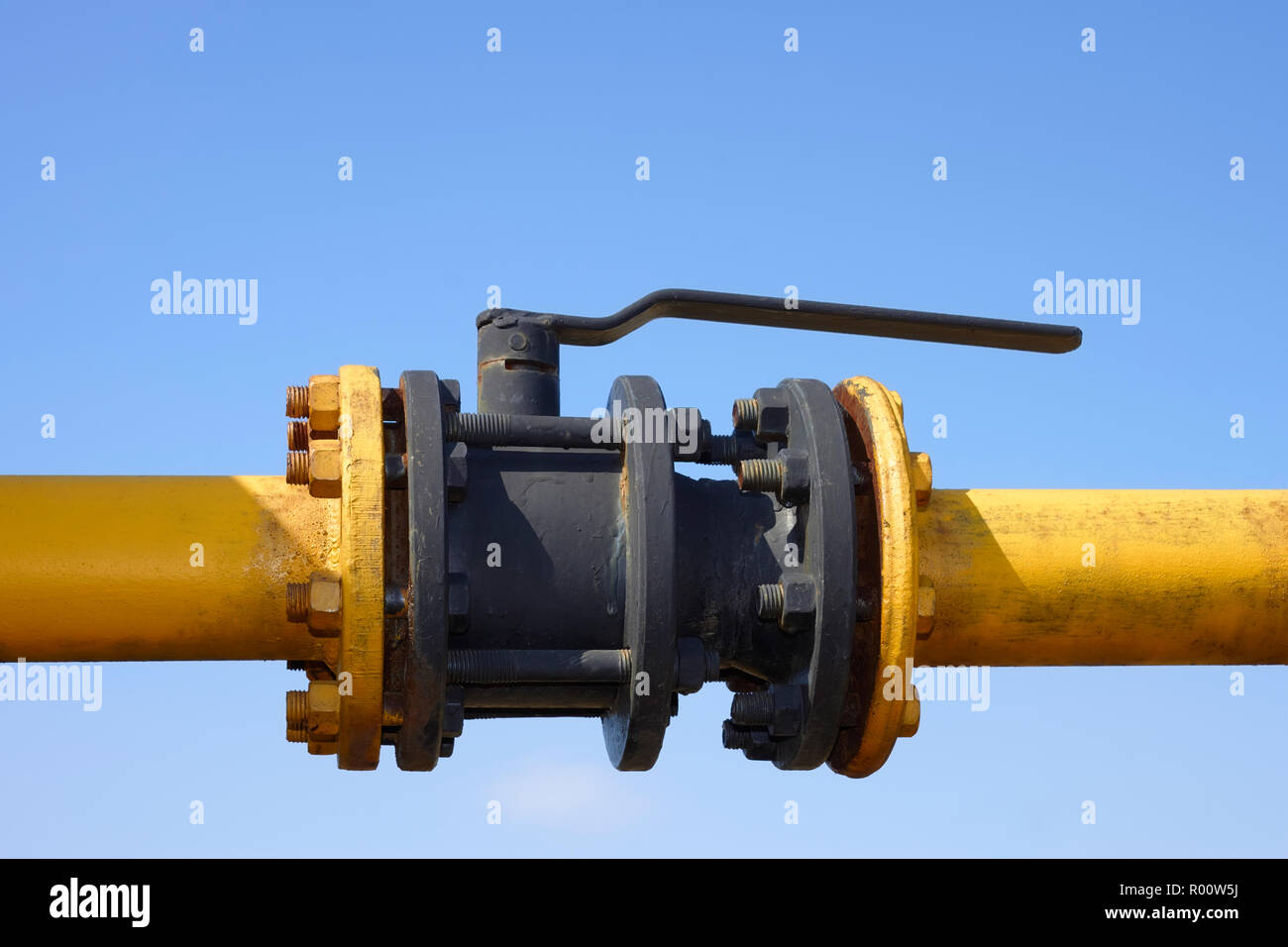 The gas valve on the background of clear blue sky. Blocking damper on ...