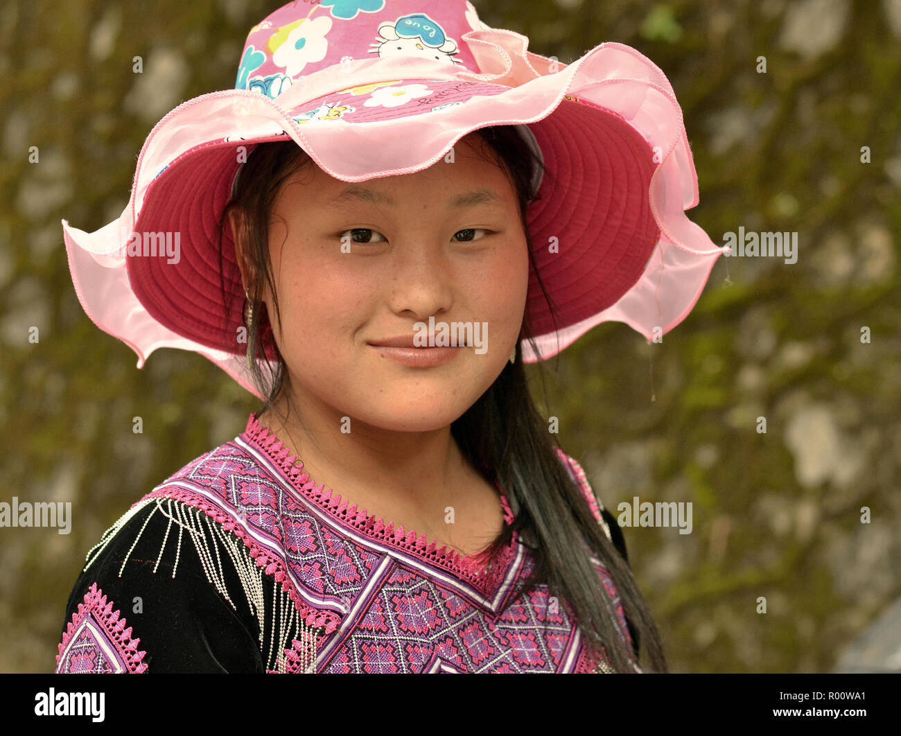 Young Vietnamese H’mong minority hill-tribe woman wears a fancy pink ...