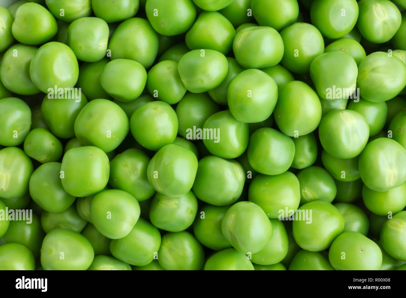 Fresh garden peas shot from above Stock Photo - Alamy