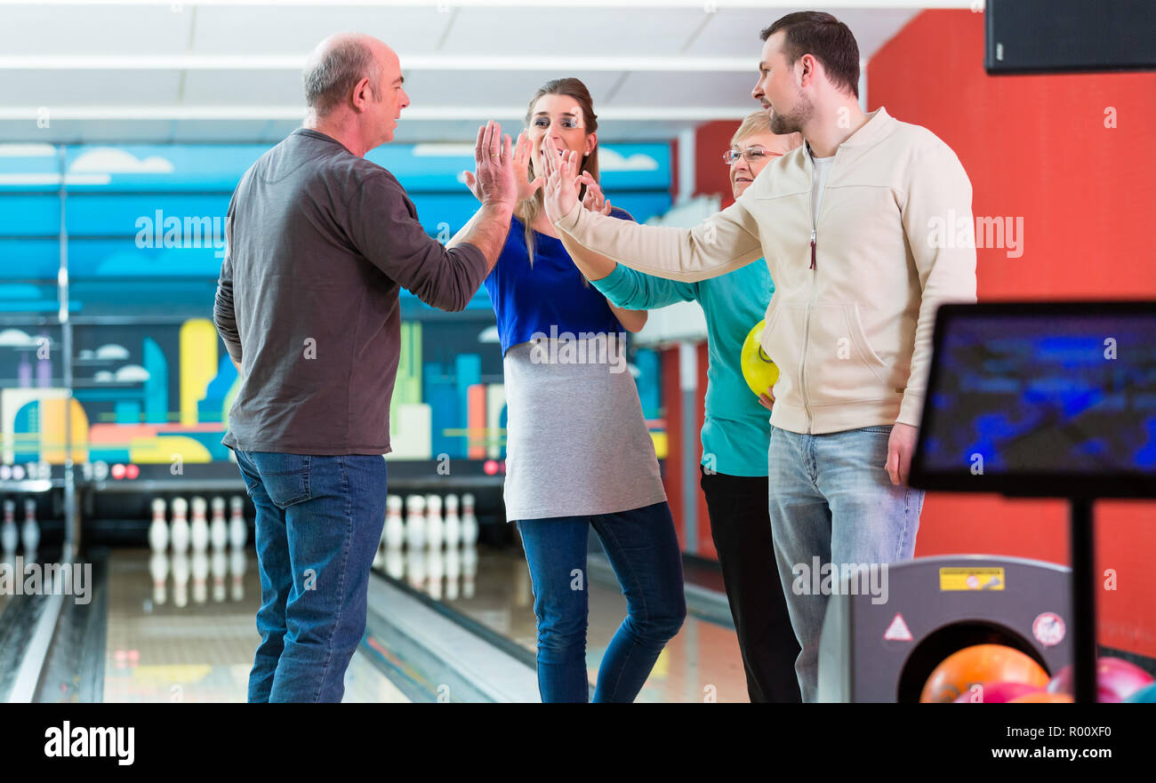 Family enjoying indoor games Stock Photo - Alamy