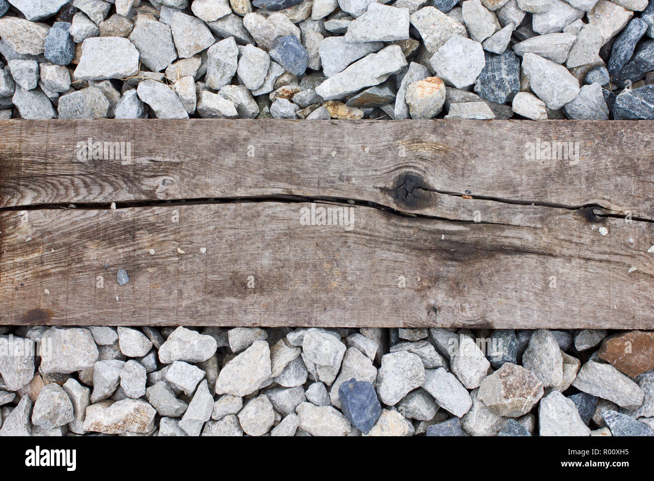 Newly laid train track timber ballast detail Stock Photo - Alamy