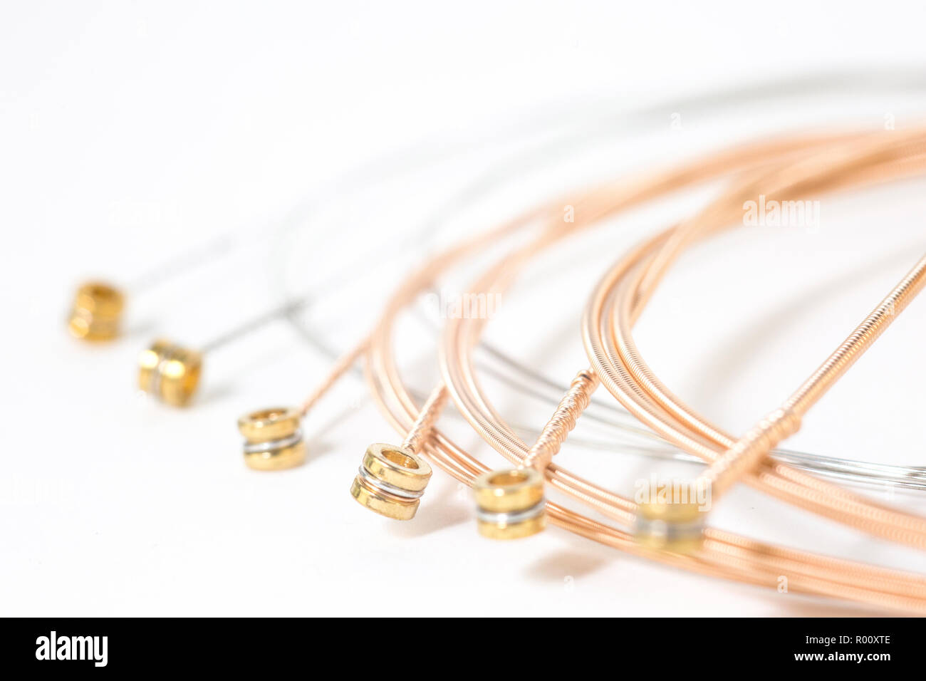 Set of twisted guitar strings isolated on white background Stock Photo ...