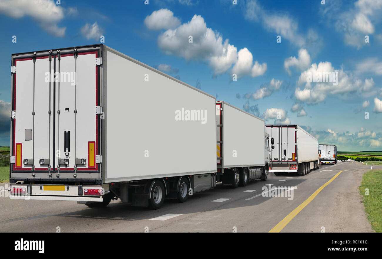 Container on the big highway. transport loads. Heavy traffic freight ...