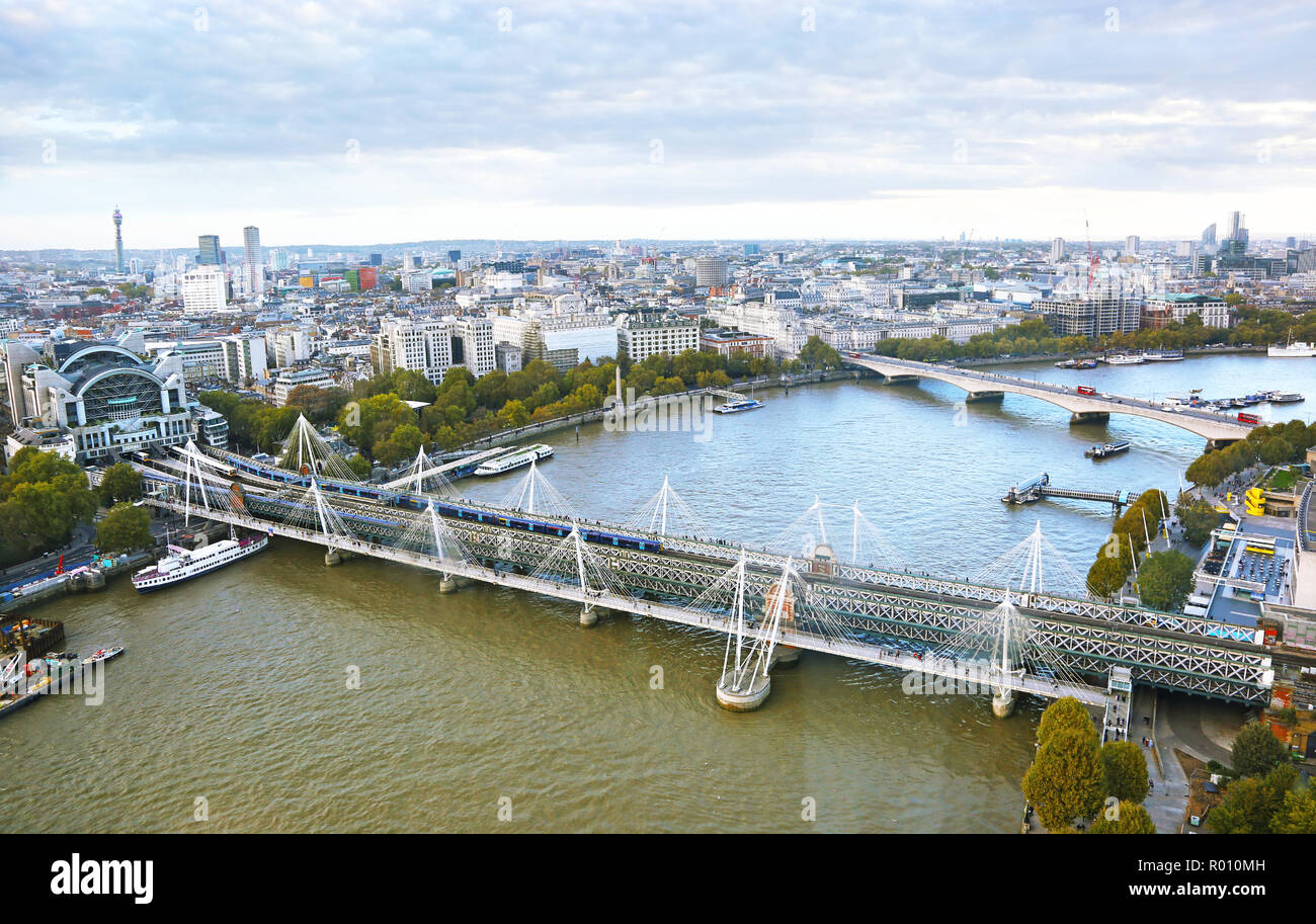 cityscape of London city - view of Thames river and Hungerford bridge ...