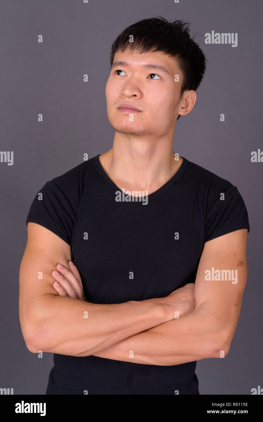 Chinese men arms hi-res stock photography and images - Alamy