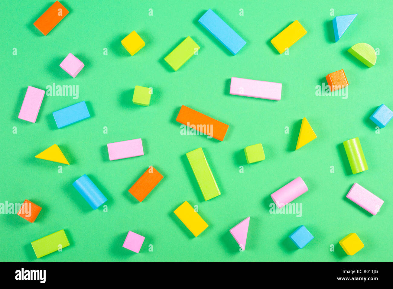Colorful wooden cubes pattern on green color background Stock Photo - Alamy Colorful wooden cubes pattern on green color background Stock Photo - Alamy