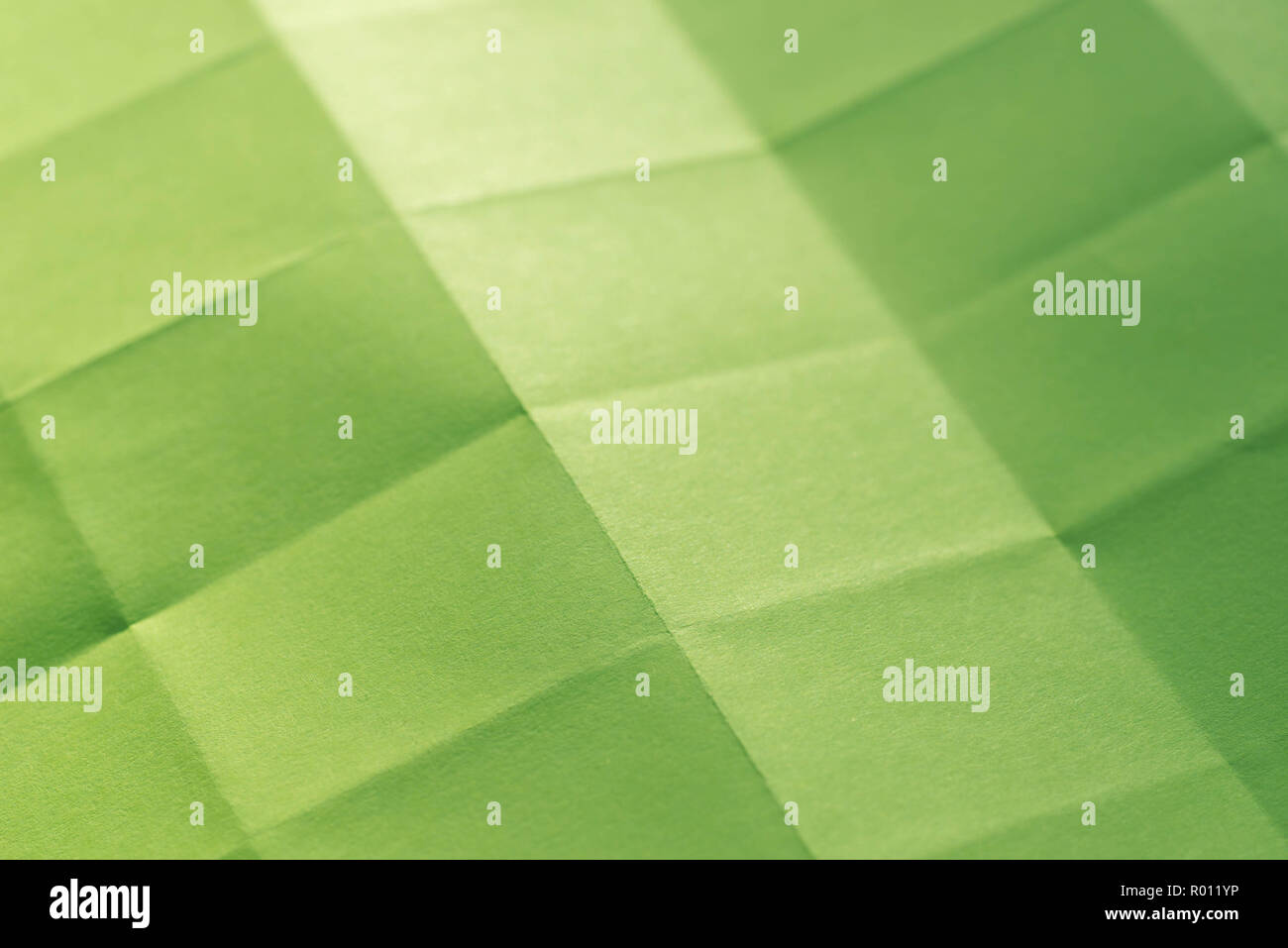 green sheet of paper folded background texture Stock Photo - Alamy