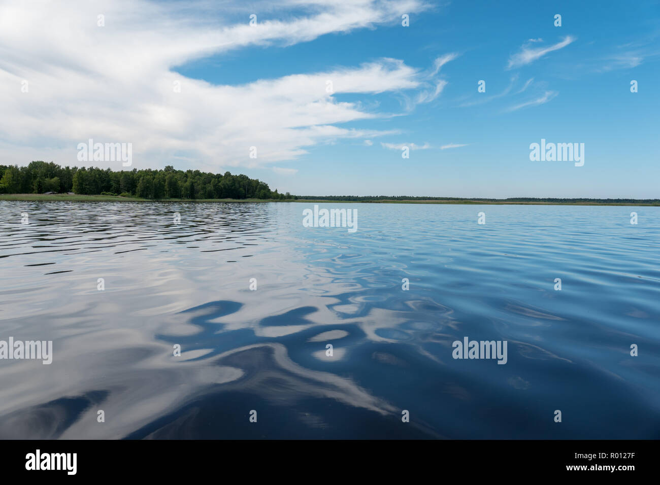 Clouds and clouds and lake surface reflection reflection hi-res stock ...