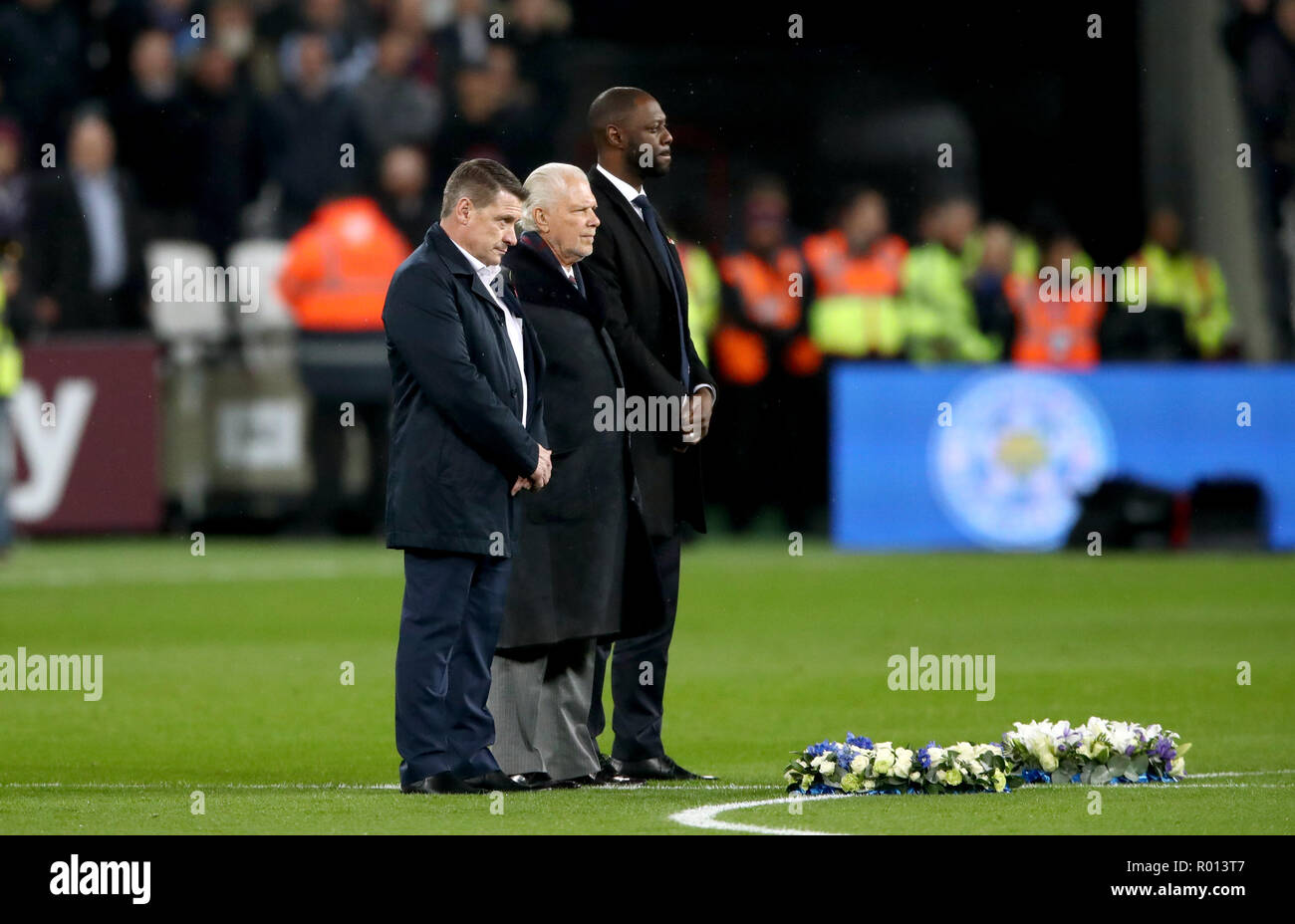Tony Cottee, David Gold and Ledley King lay wreaths on the pitch in ...