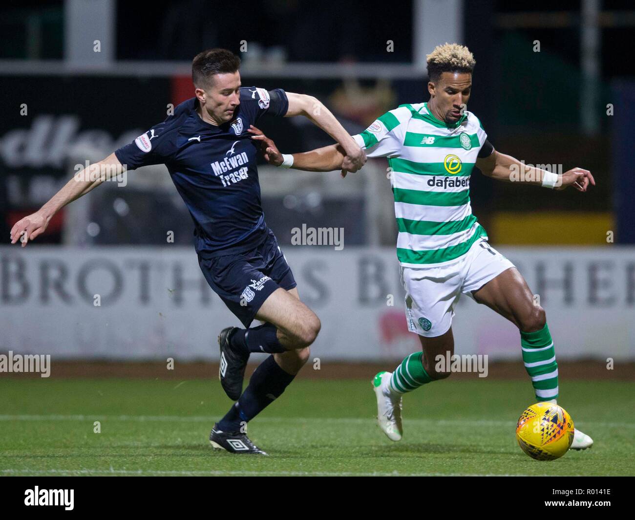 Celtic's Scott Sinclair (right) Dundee's Cammy Kerr battle for the ball ...