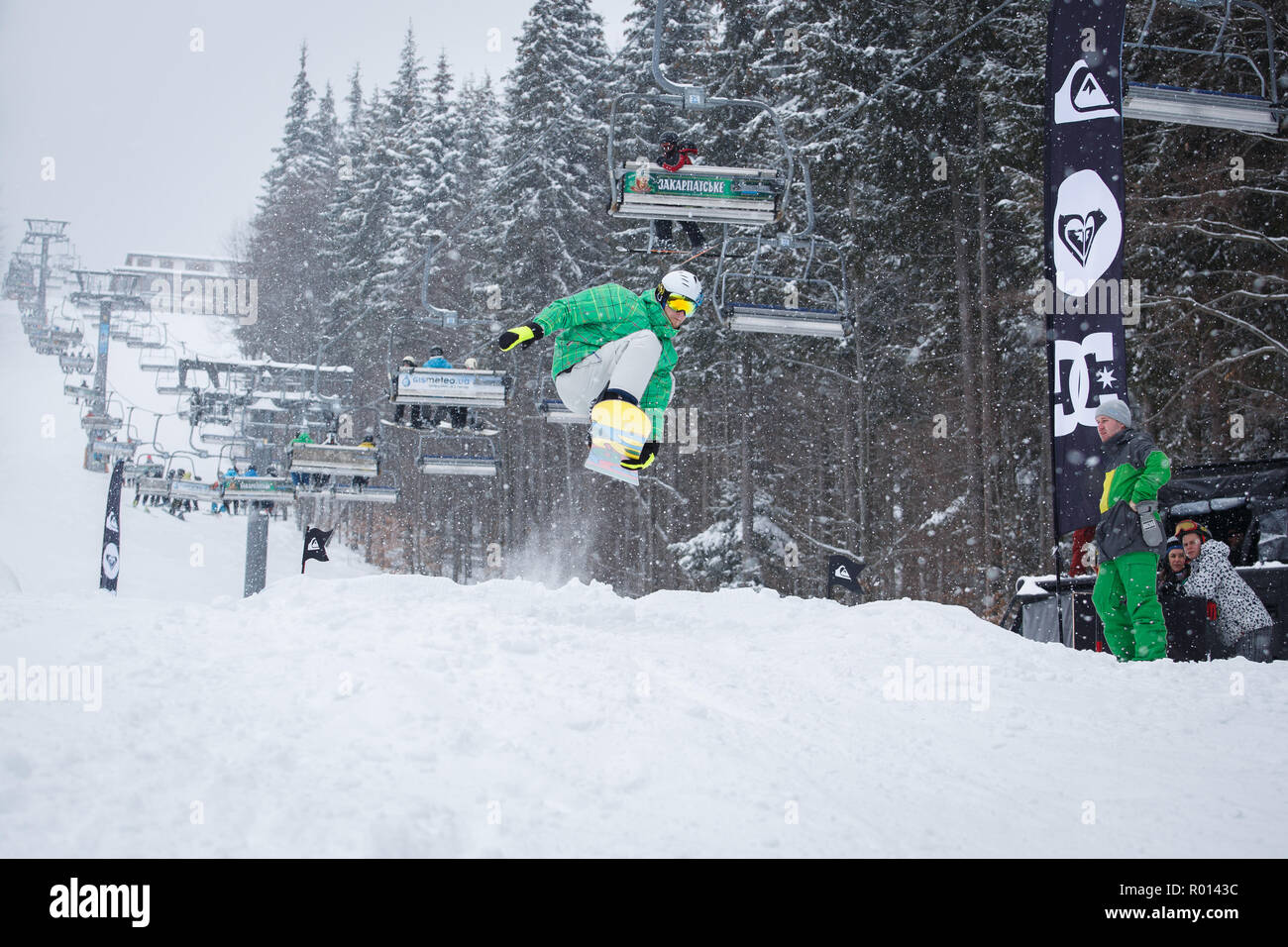 BUKOVEL,UKRAINE-20 MARCH,2018: Snowboard contest in winter park.Young ...