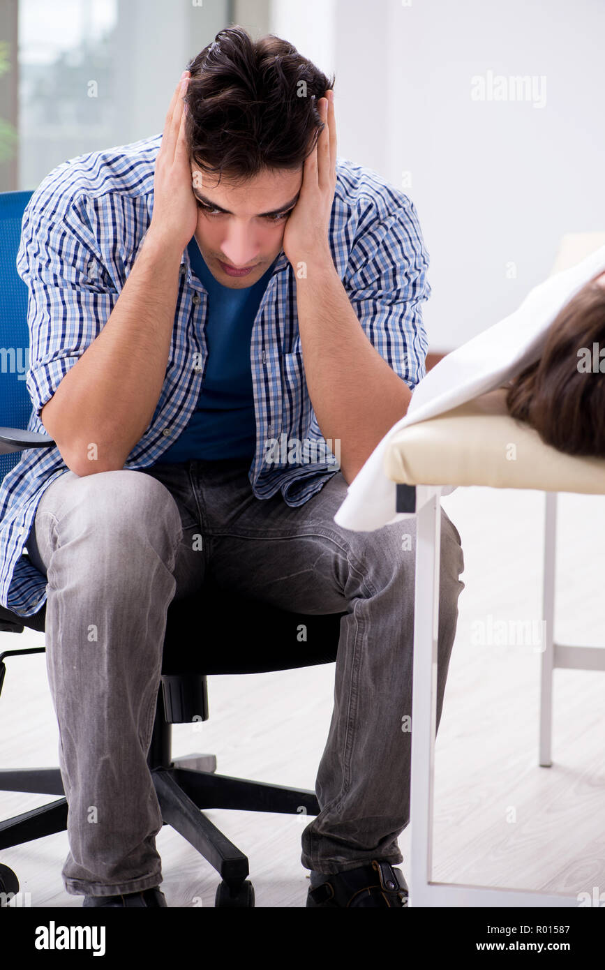 Man mourning his dead wife Stock Photo - Alamy