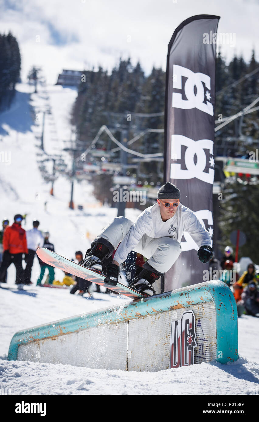 Snowboarder grinding rail hi-res stock photography and images - Alamy