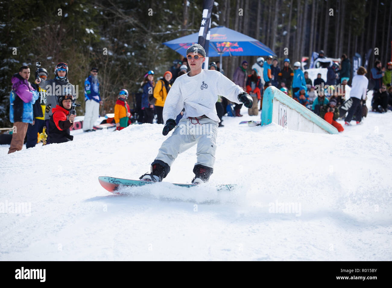 BUKOVEL,UKRAINE-24 MARCH,2018: Snowboard jib contest on rails in snow ...