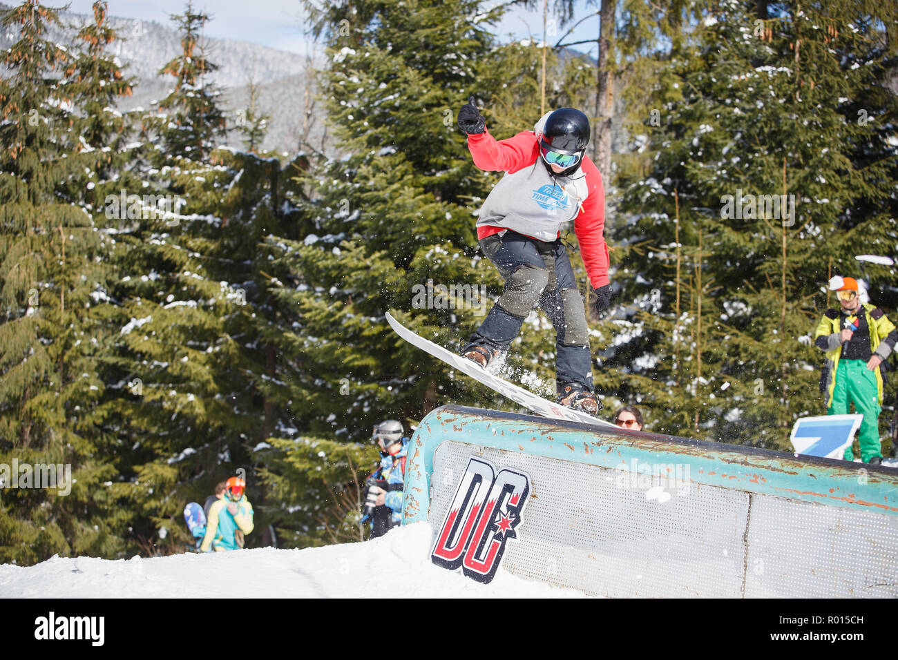 BUKOVEL,UKRAINE-24 MARCH,2018: Snowboard jib contest on rails in snow ...